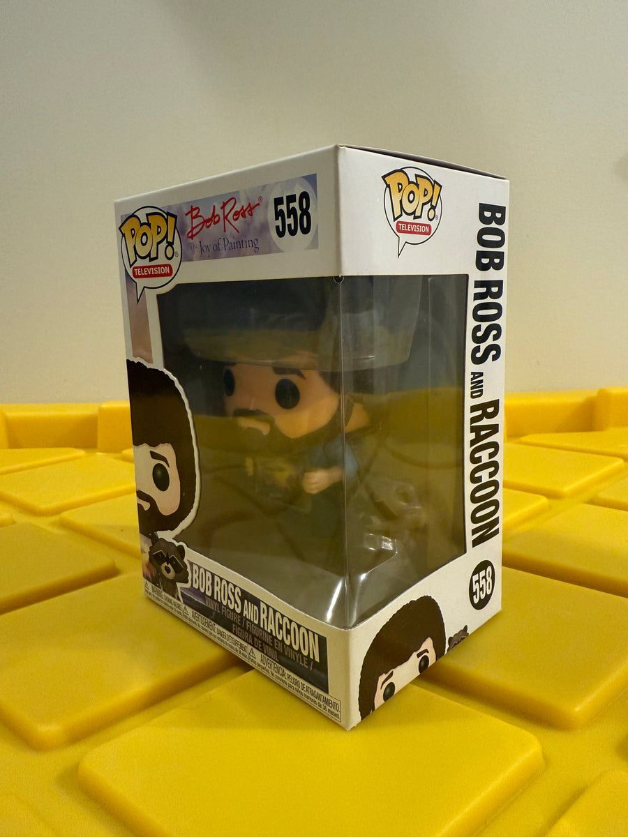 Bob Ross and Raccoon – Black Panther Collectables